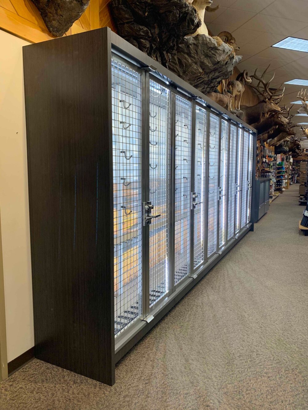 Scheels Gun Cabinet Installation | Thomas Grace Construction